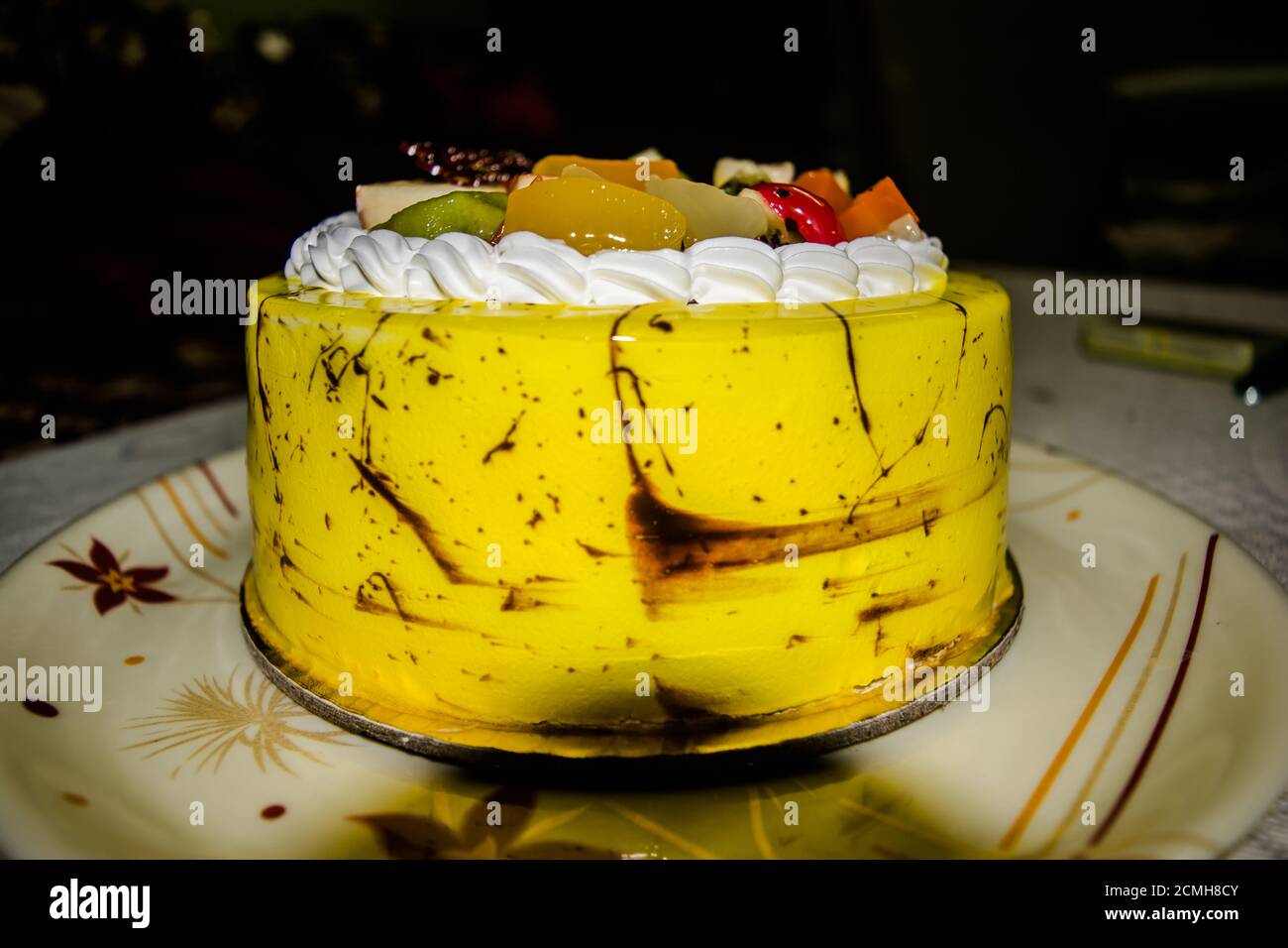 Tasty yellow Fruit Cake with vanilla flavor Stock Photo - Alamy
