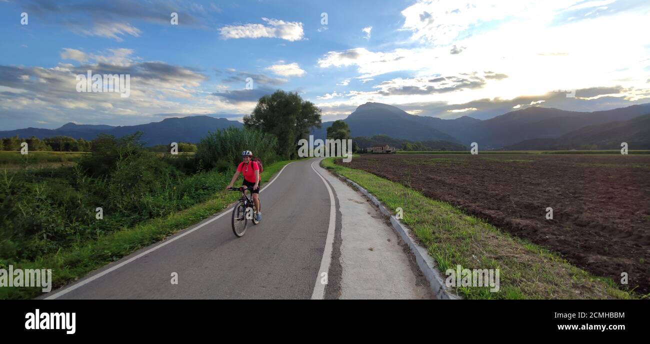 Road bicyclist scenery hi-res stock photography and images - Alamy