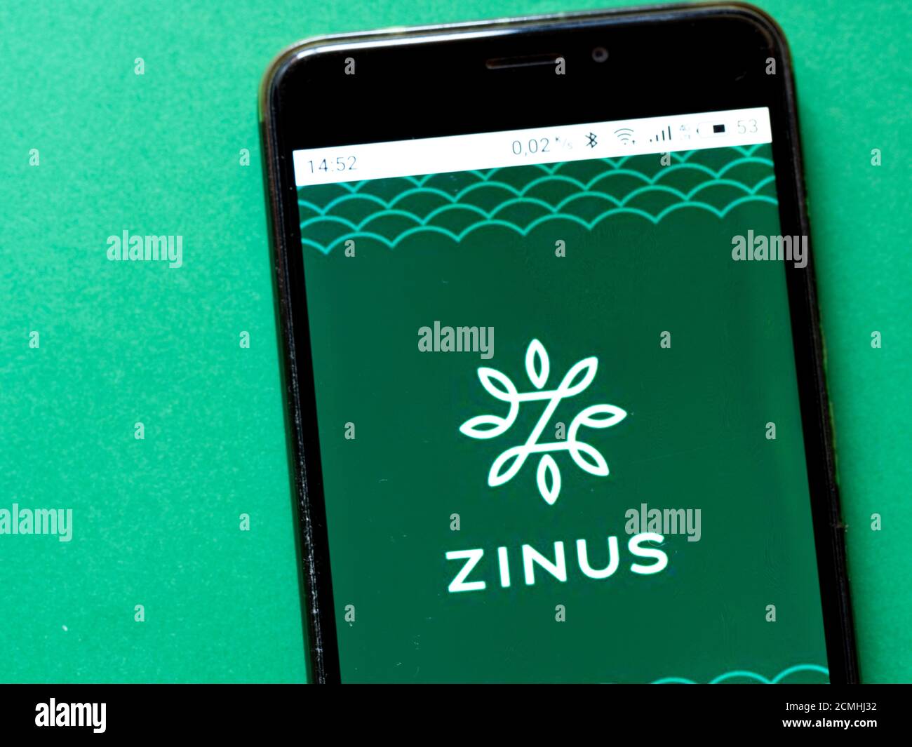 In this photo illustration a Zinus logo is seen displayed on a ...
