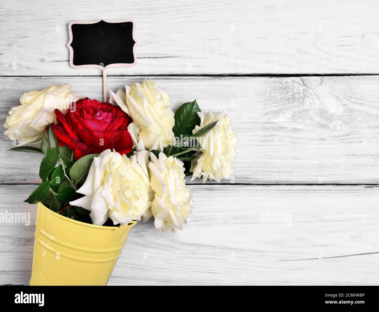 bouquet of white roses and a single red rose Stock Photo - Alamy