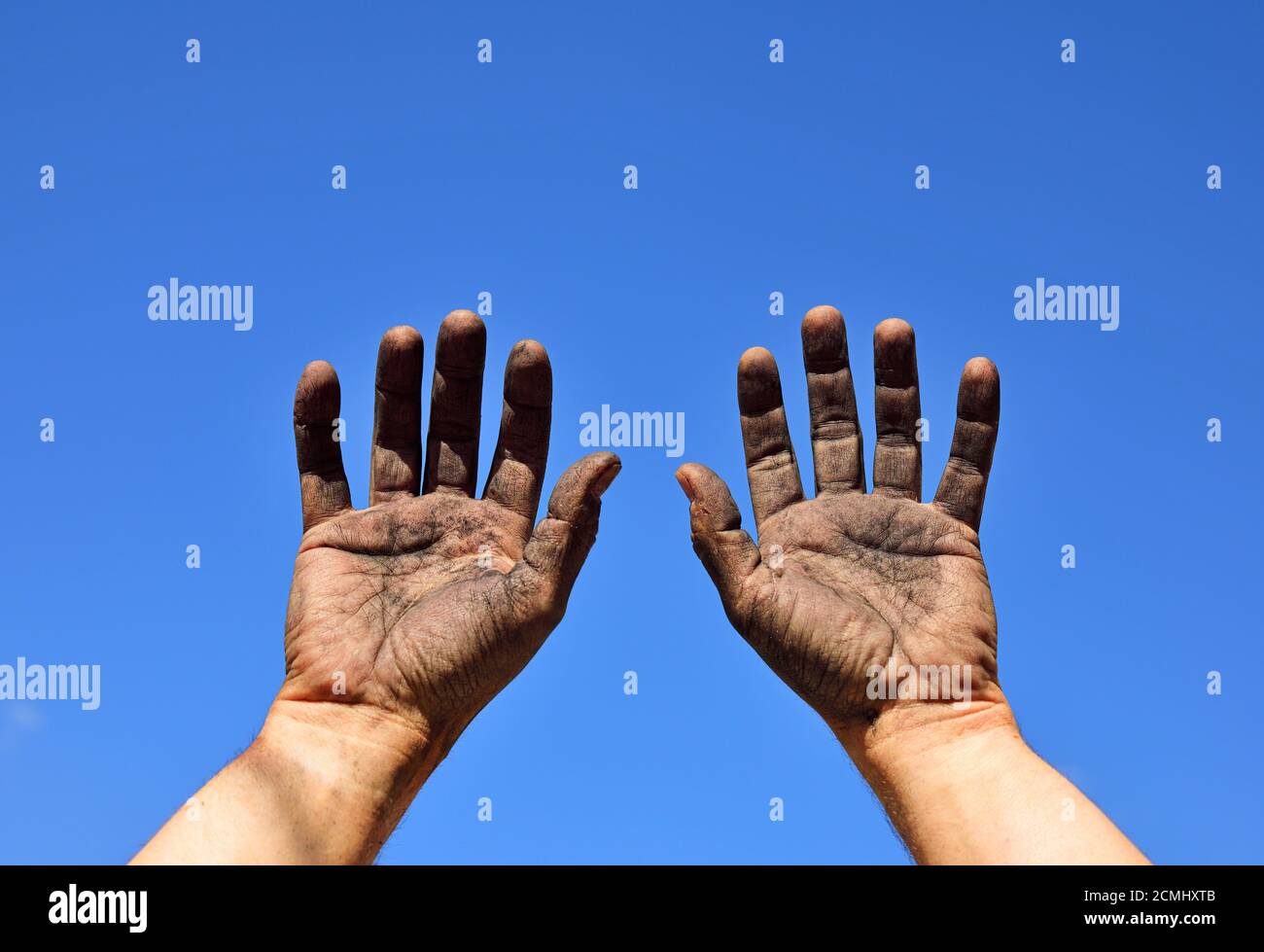 Two hands raised sky hi-res stock photography and images - Alamy