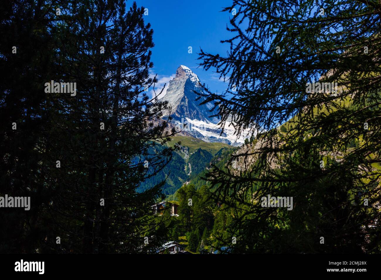 Sunny summer morning in Zermatt village with Matterhorn peak on ...