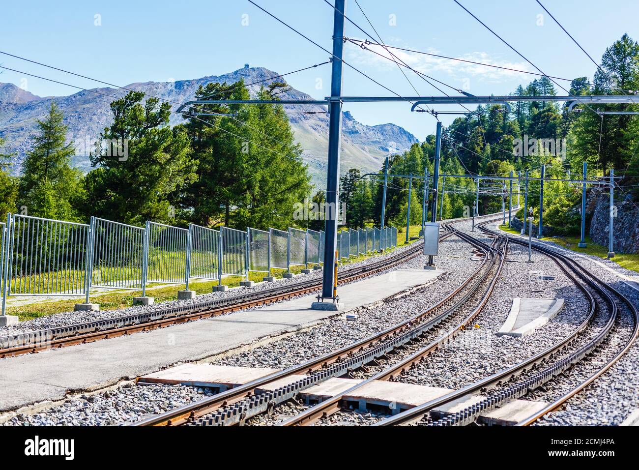 Swiss mountain train crossed Alps, railway in the mountains Stock Photo ...
