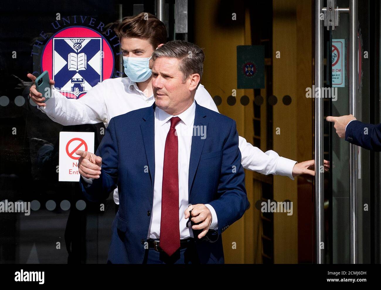 Labour leader Sir Keir Starmer (right) leaving the Chancellor's ...