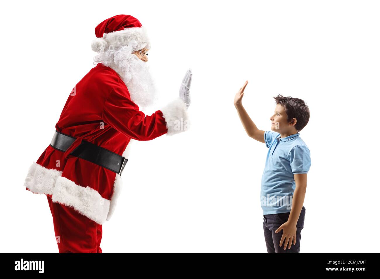 Santa gesturing high-five with a boy isolated on white background Stock ...