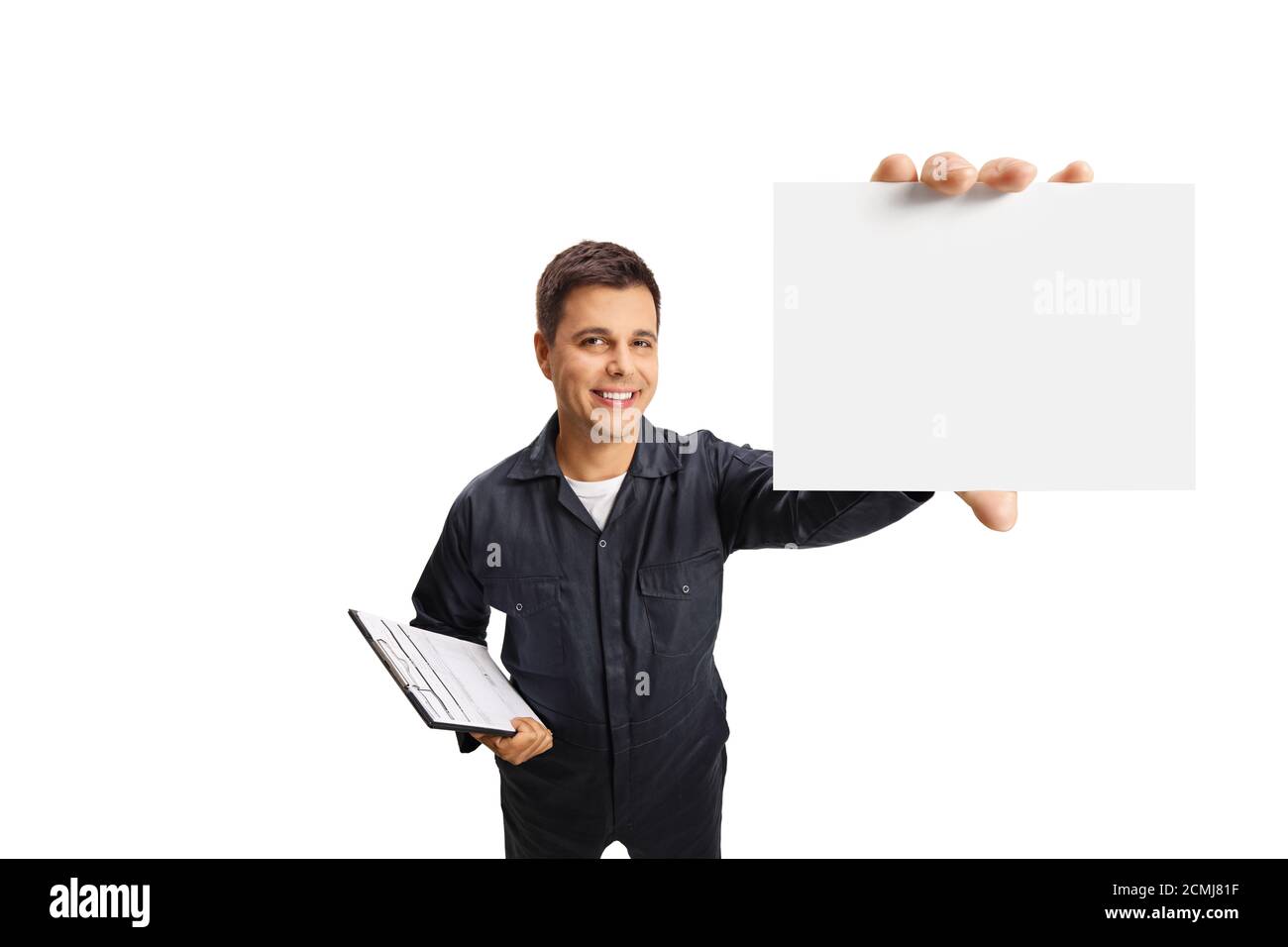 Auto mechanic worker holding a blank card in fron of camera isolated on ...
