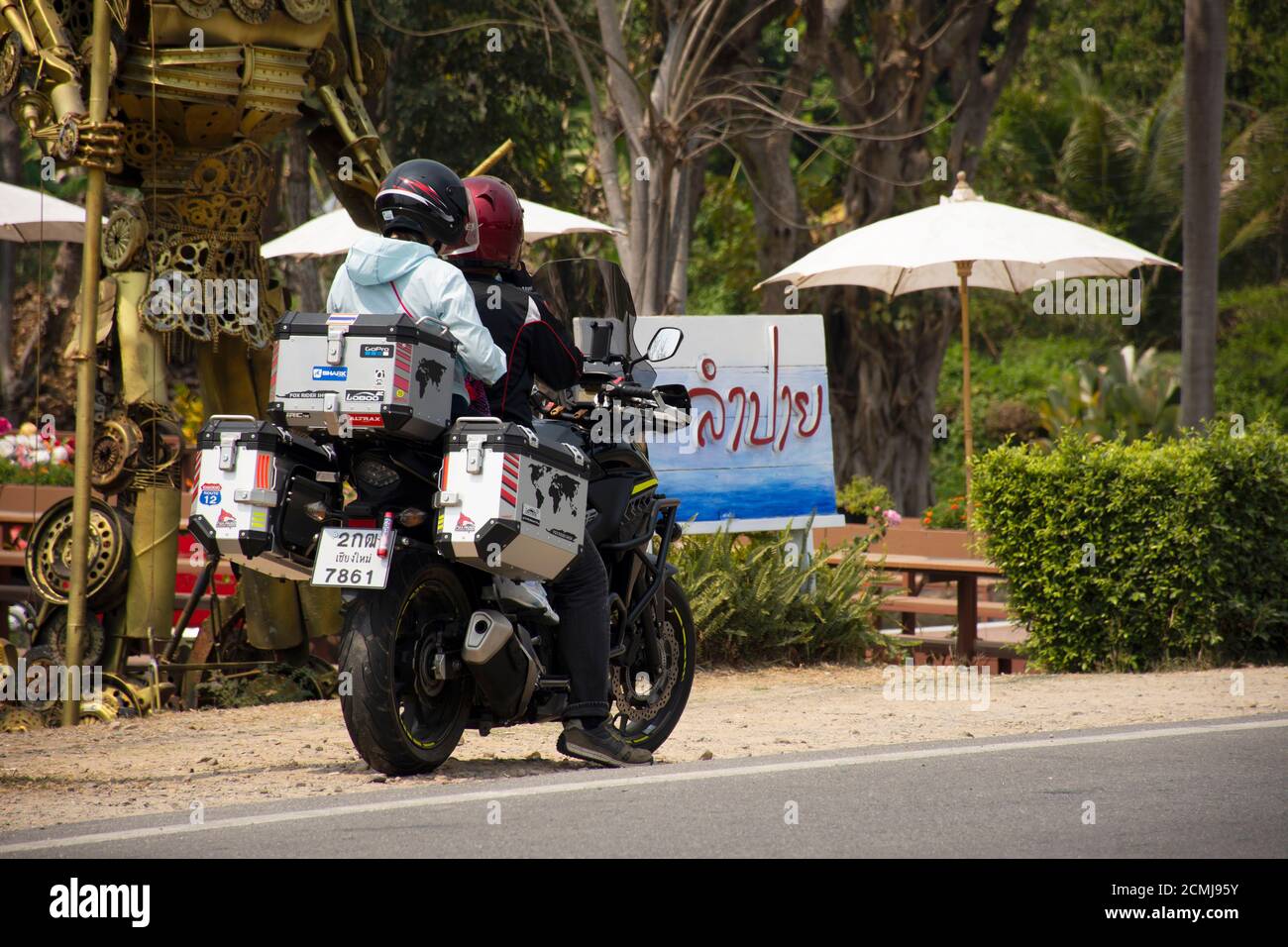 Asian boy with big bike hi-res stock photography and images - Alamy