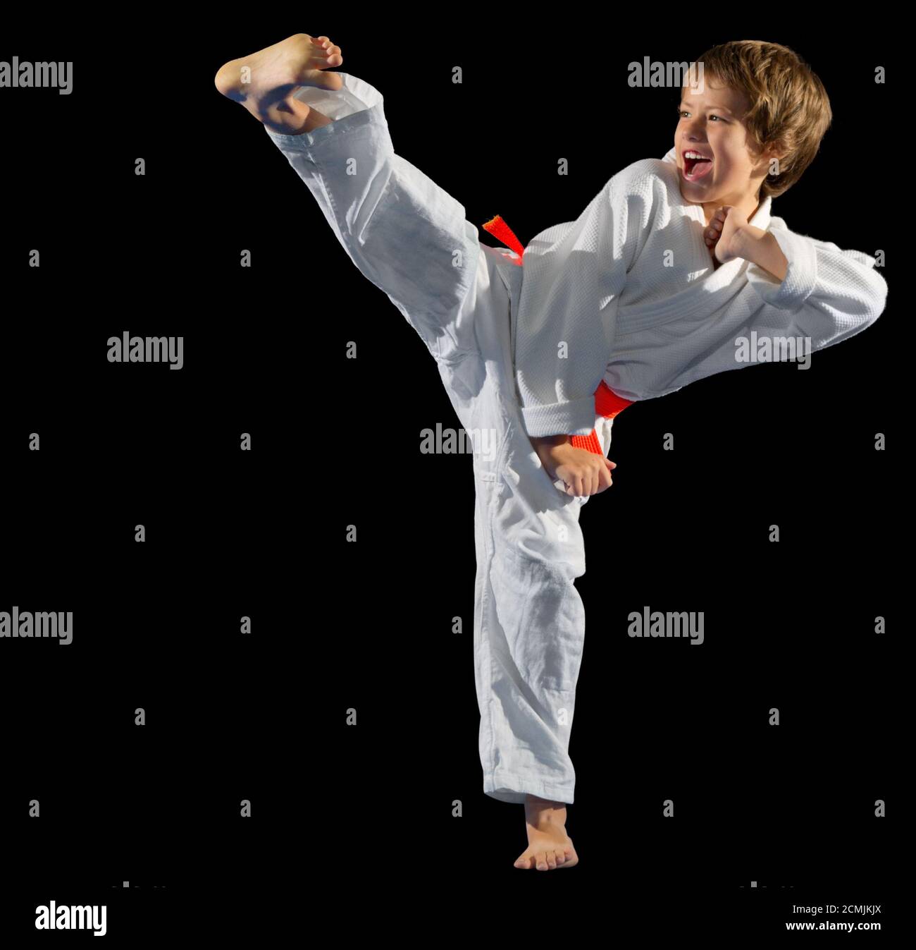 Boy martial arts fighter isolated Stock Photo - Alamy