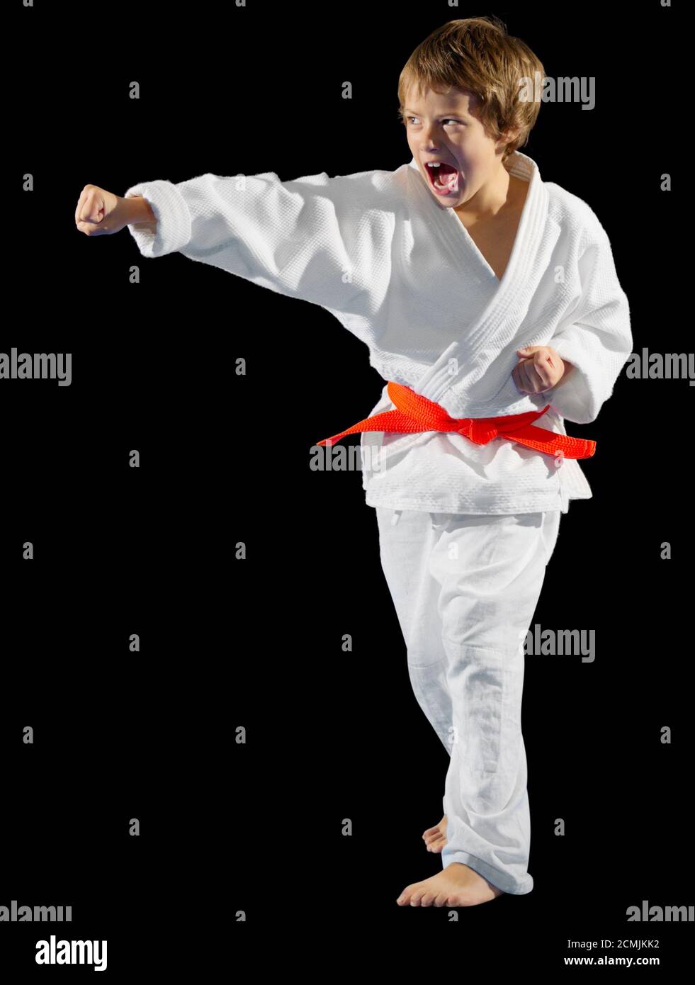 Boy martial arts fighter isolated Stock Photo - Alamy
