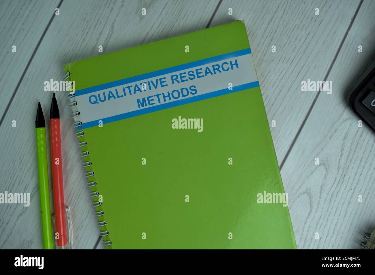 Qualitative Research Methods write on a book isolated on office desk ...