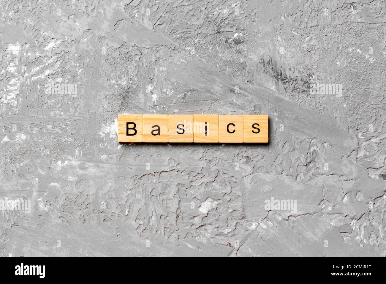 BASICS word written on wood block. BASICS text on table, concept Stock ...