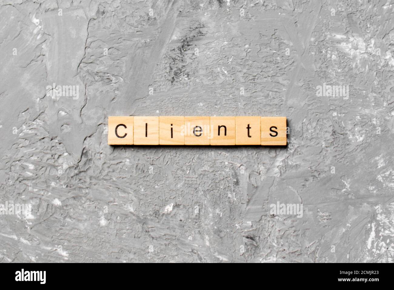 Clients word written on wood block. Clients text on table, concept ...