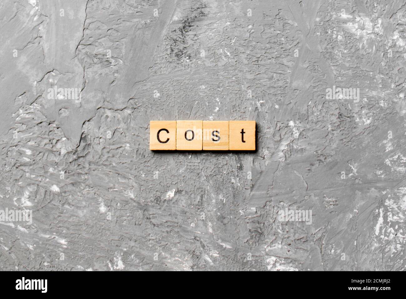 COST word written on wood block. COST text on table, concept Stock ...