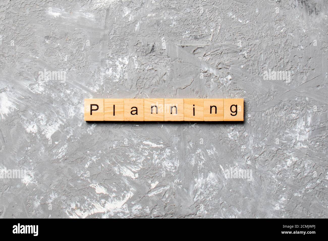 planning word written on wood block. planning text on table, concept ...