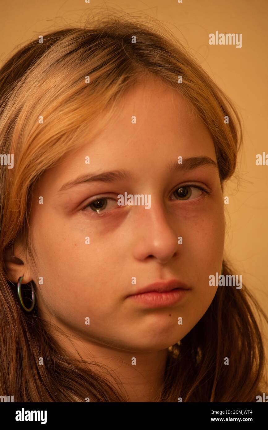 Portrait of little girl crying with tears rolling down her cheeks. Girl crying. Girl 9 years old ...