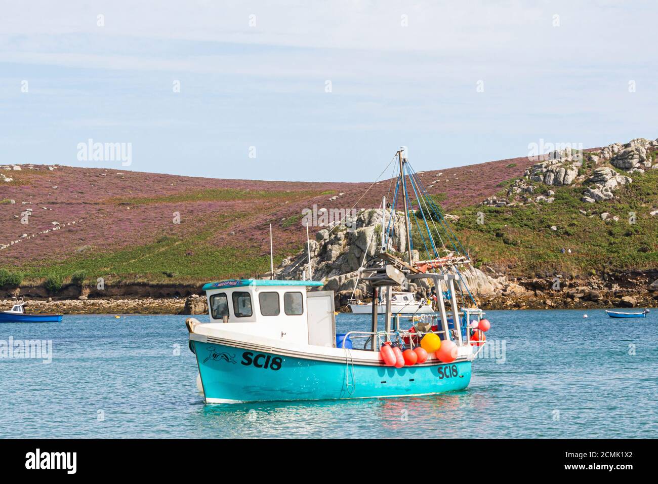 Fishing boat Helgi Mor off the coast of Bryher, Isles of Scilly Stock ...