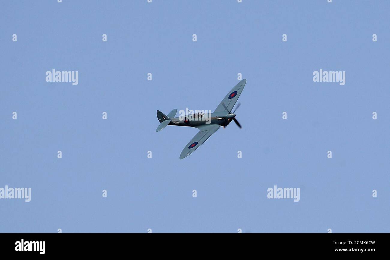 Pilot John Romain with "Thank You NHS" Spitfire as it flys over ...