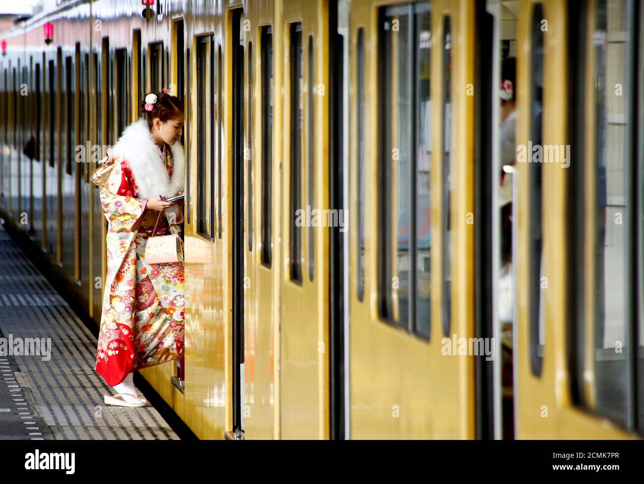 Woman on train japan hi-res stock photography and images - Alamy