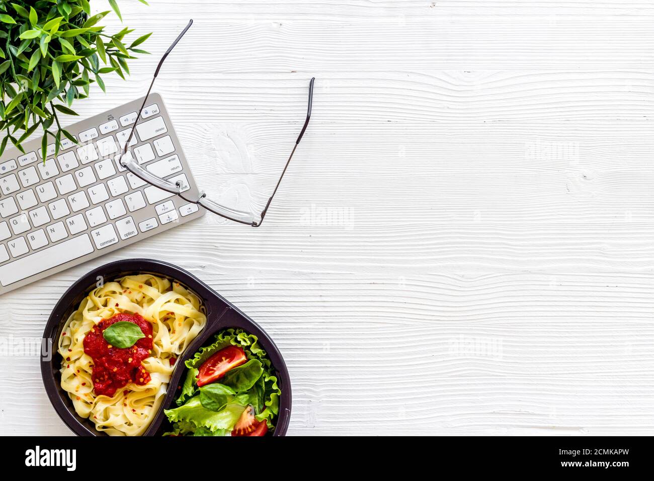 Lunch at workplace. Delivery boxes with meal, top view Stock Photo - Alamy