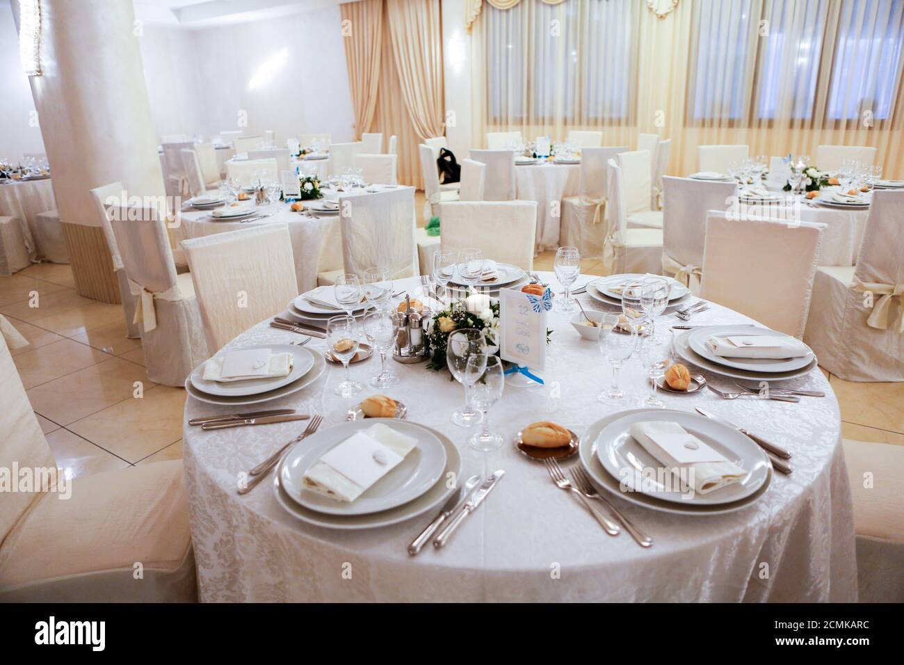 table setting for wedding guests ceremony buffet reception. High ...