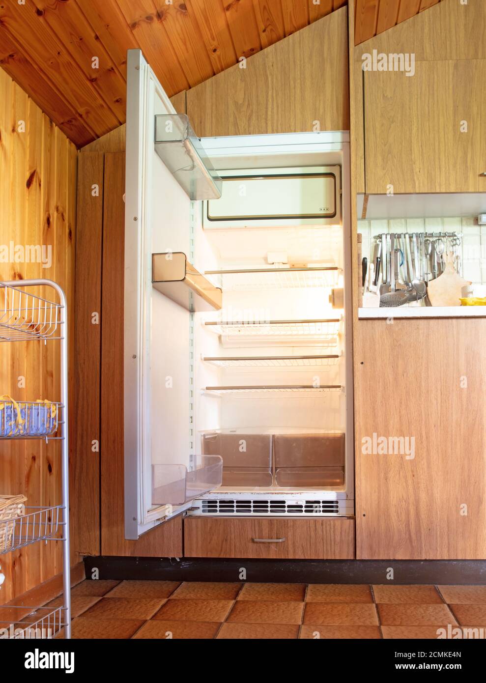 Old open fridge in a dated kitchen Stock Photo - Alamy