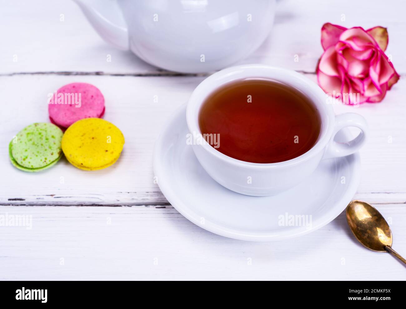 tea in a white round cup with a saucer Stock Photo - Alamy