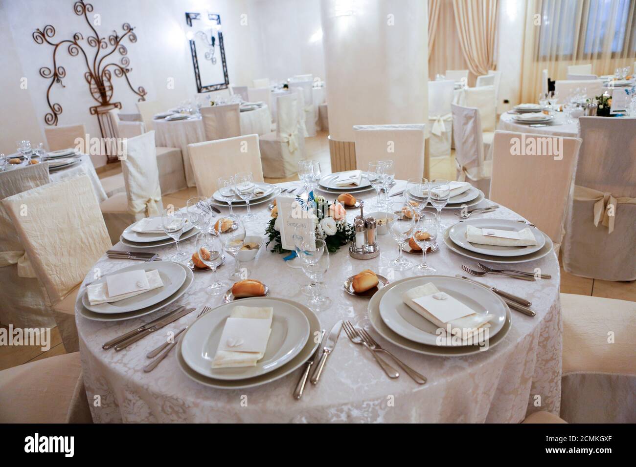 table setting for wedding guests ceremony buffet reception. High ...