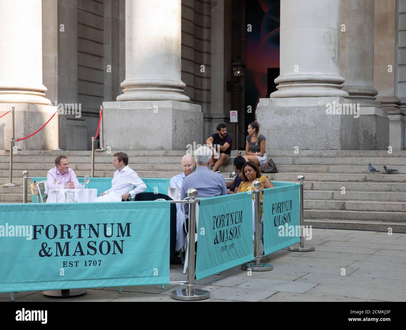People dine Alfresco in a Fortnum and Mason Pop up restaurant in London ...