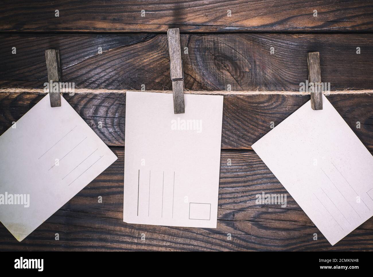 three empty old postcards Stock Photo - Alamy