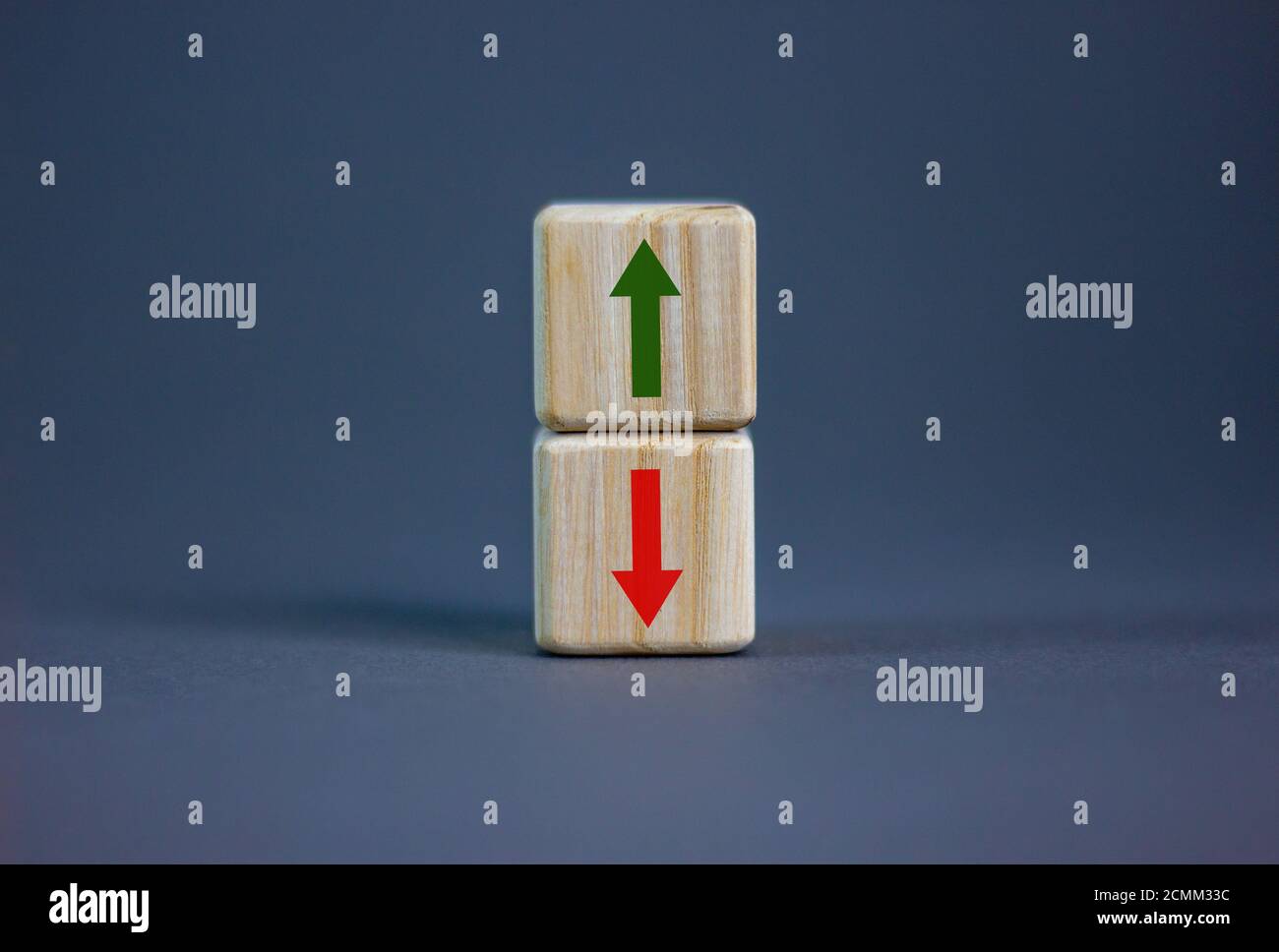 Conceptual image of choice and direction. Wooden cubes with arrows ...