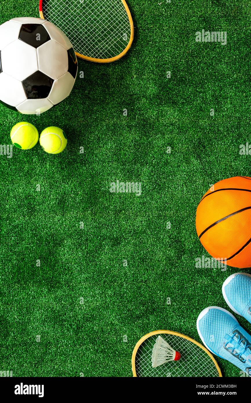 Flat lay of sport balls - football, basketball on grass top view copy ...