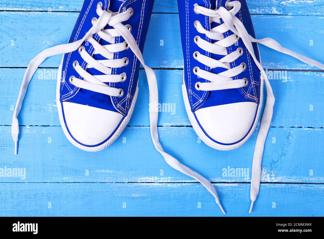 Blue textile shoes hi-res stock photography and images - Alamy