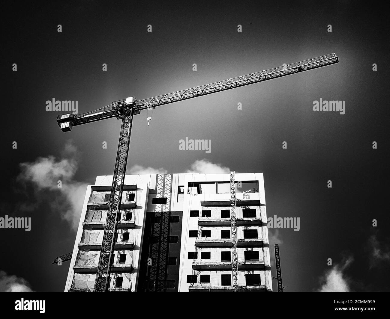 Concrete building under blue Black and White Stock Photos & Images - Alamy
