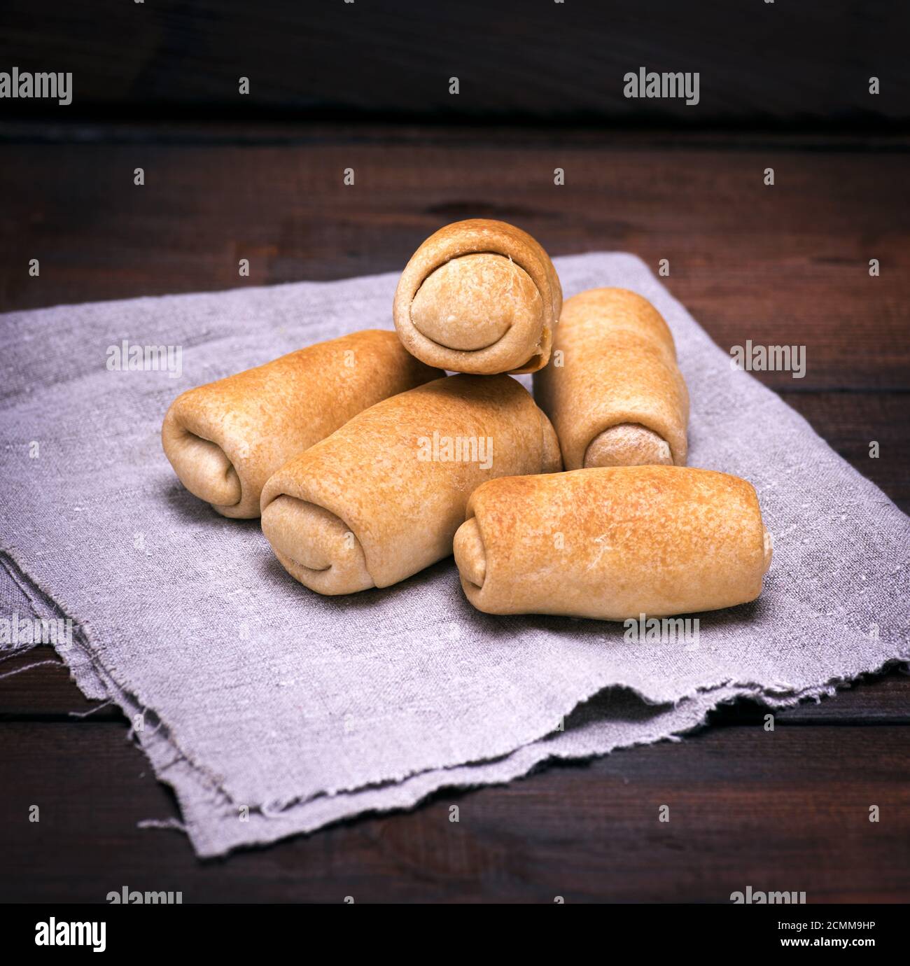 homemade baked patties with a stuffing Stock Photo - Alamy