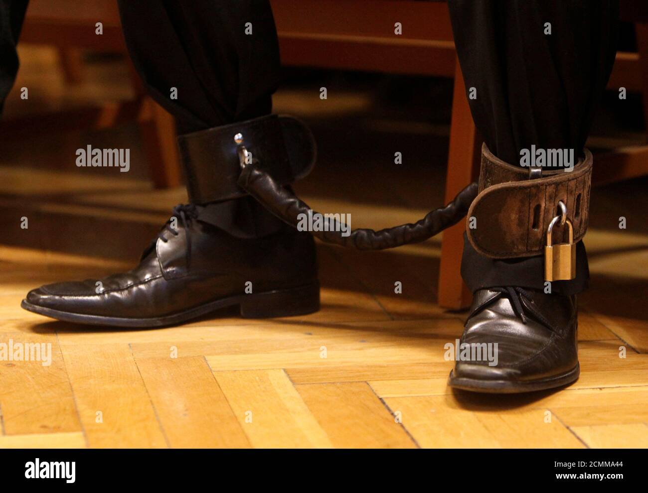 Chained feet hi-res stock photography and images - Alamy