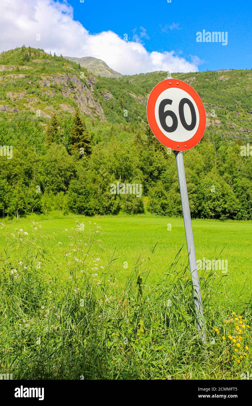 60s zone 60 road sign around red in Norway Stock Photo - Alamy