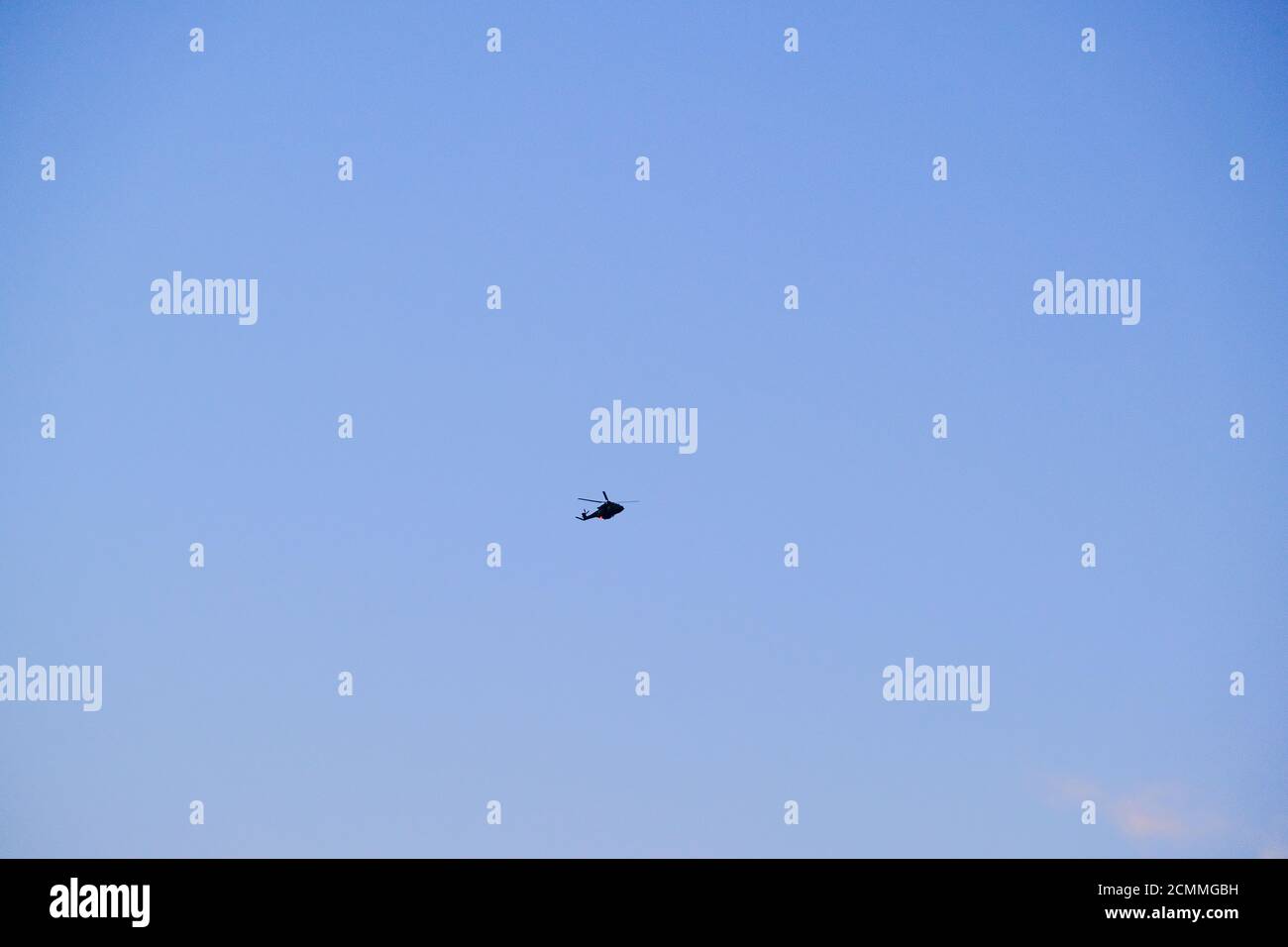 military helicopter flying in blue sky. High quality photo Stock Photo ...