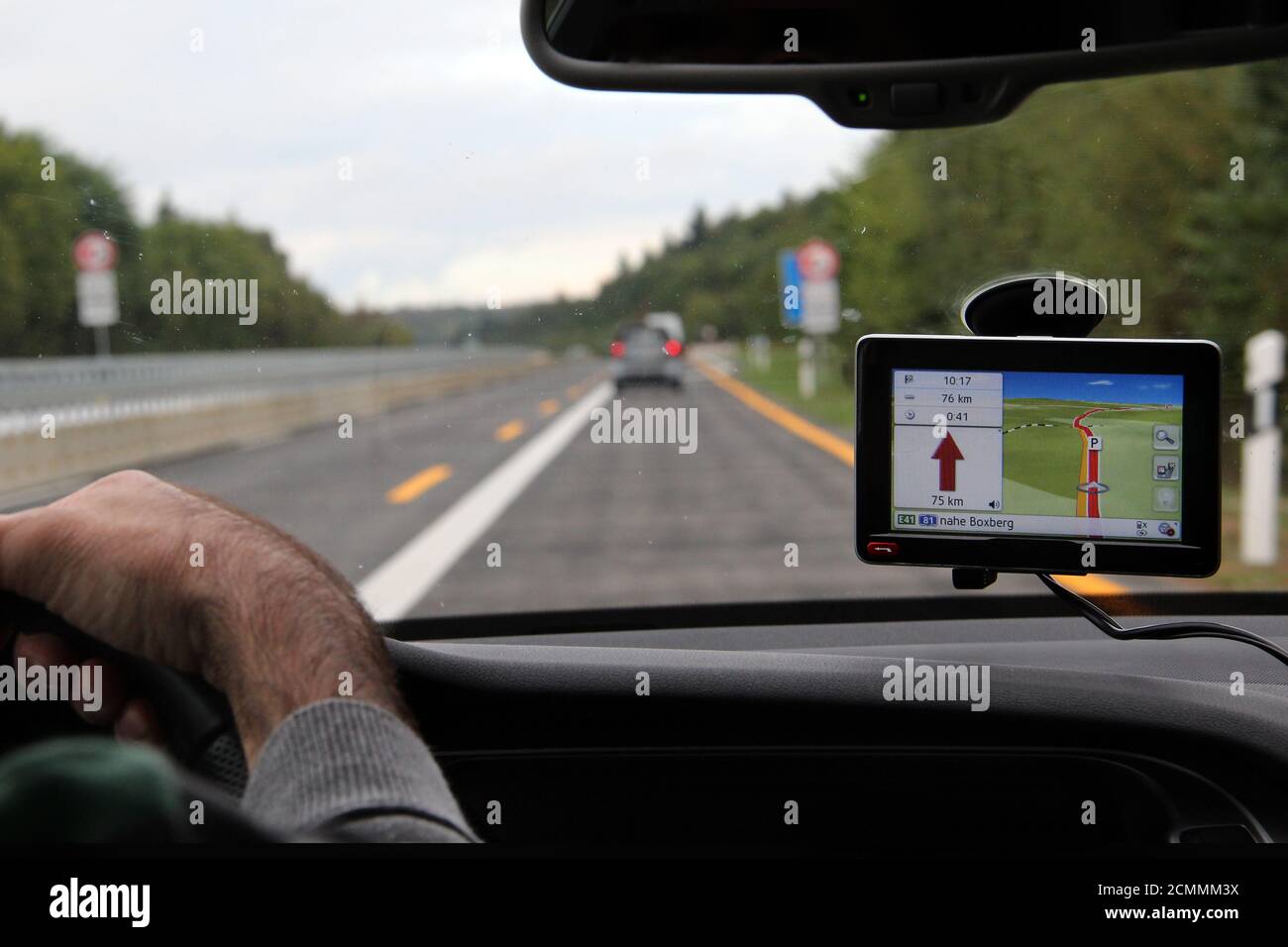 Closeup of a smart navigation system on the front window Stock Photo ...