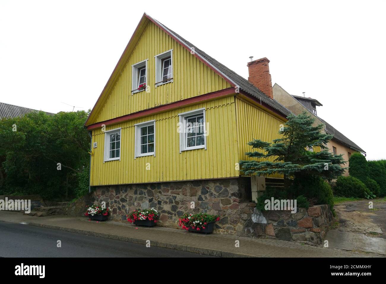 A typical triple-windowed wooden Karaim house, Trakai, Lithuania ...