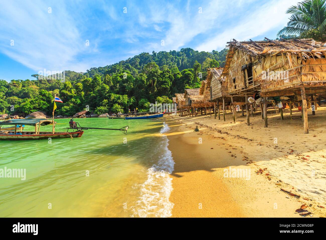 Traditional long-tail boats and houses of Moken tribe Village or Sea ...