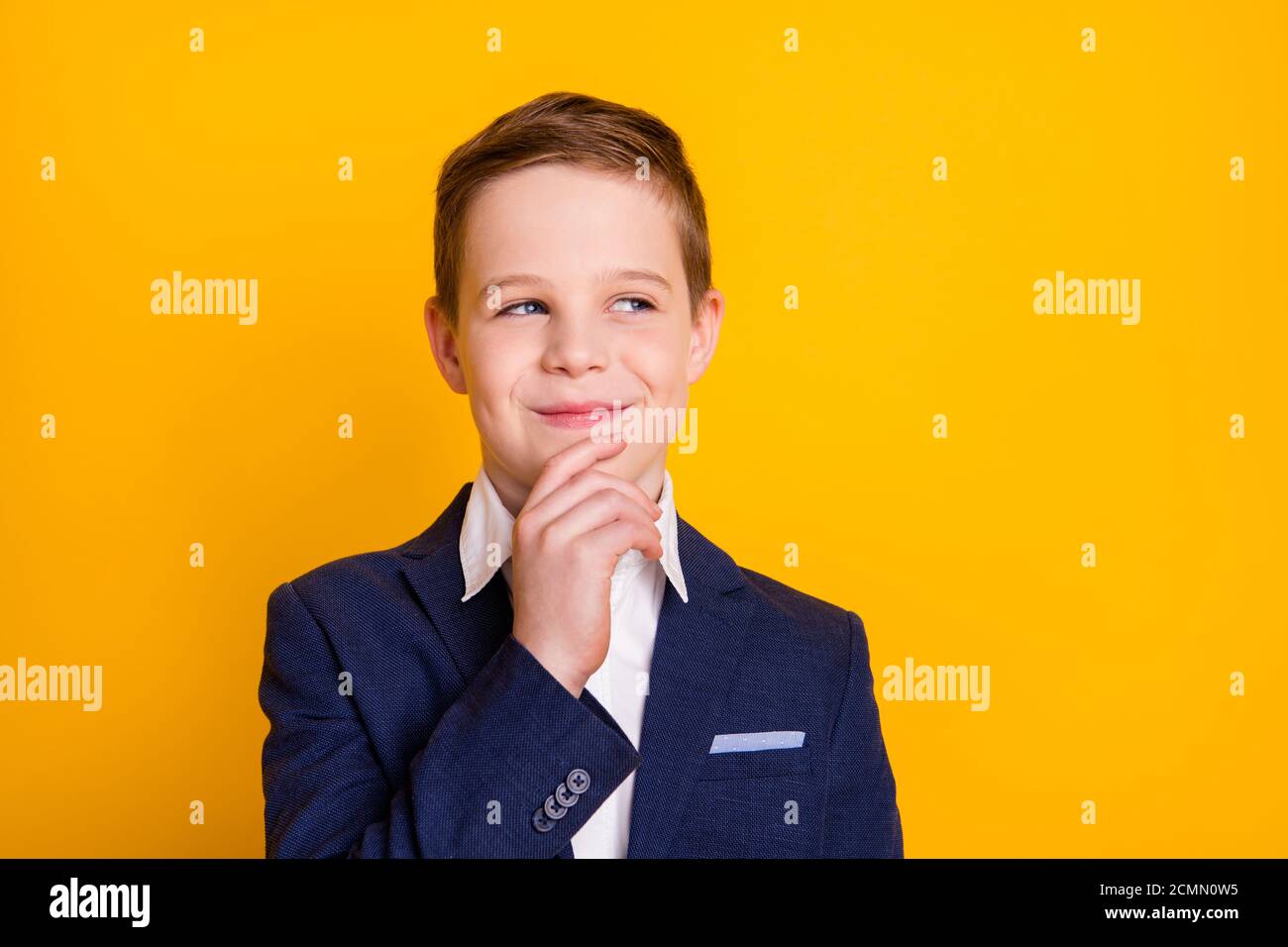 Close-up portrait of his he handsome curious minded cheery pre-teen boy ...