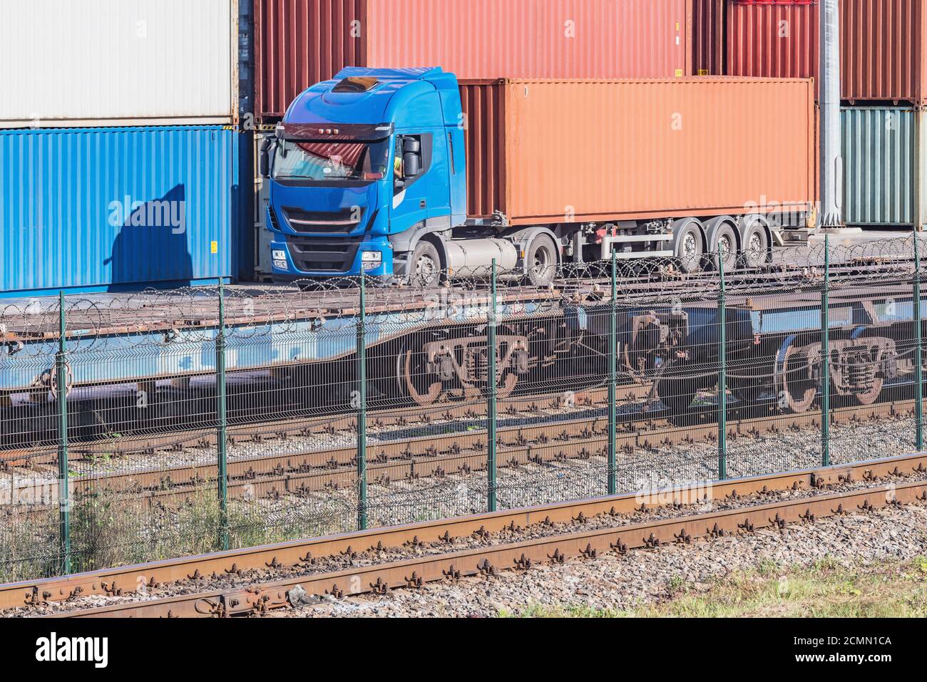 Freight truck arrives to the railway container terminal Stock Photo - Alamy