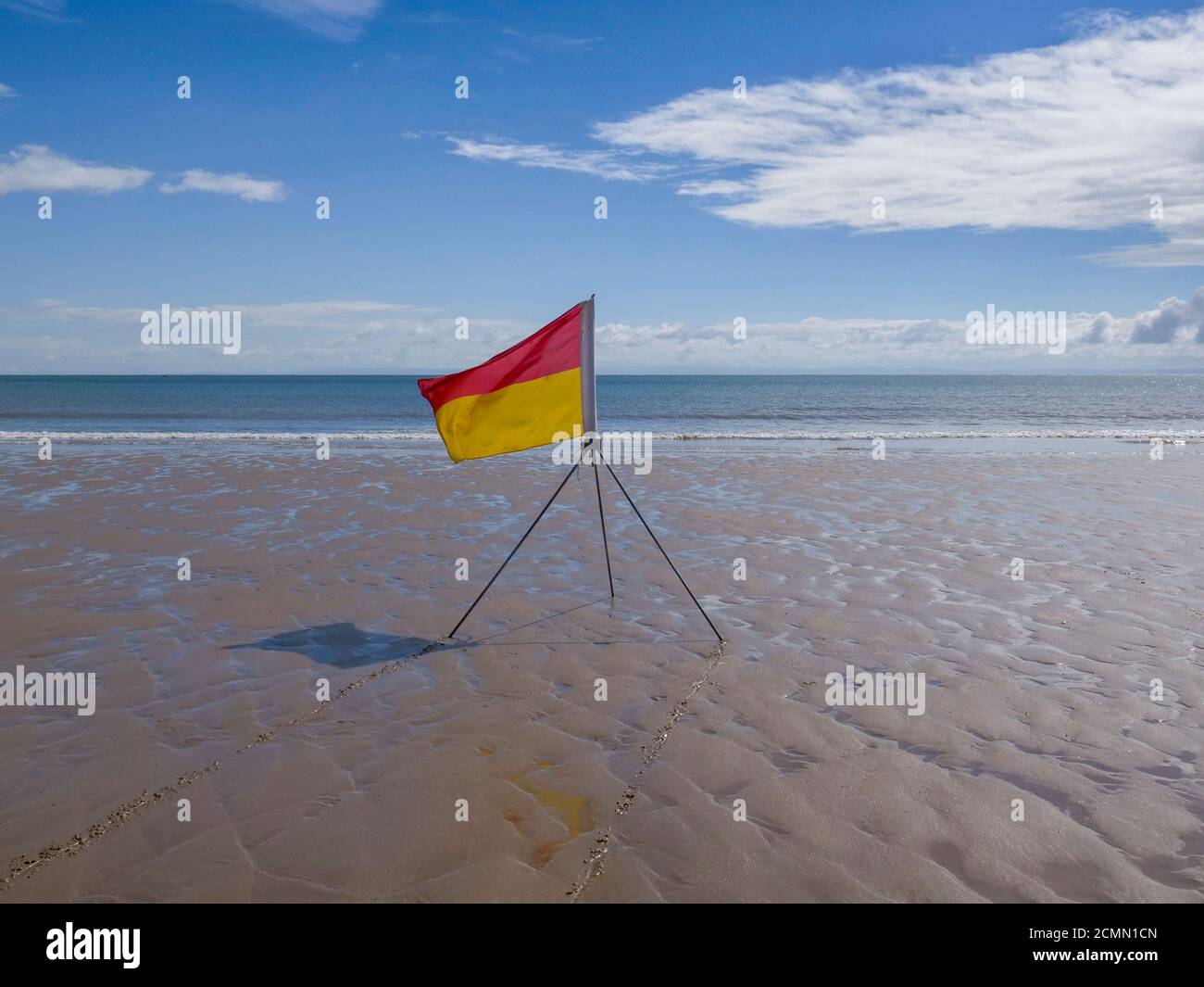 Lifeguard warniing flags on the beach at Port Eynon on the Gower ...