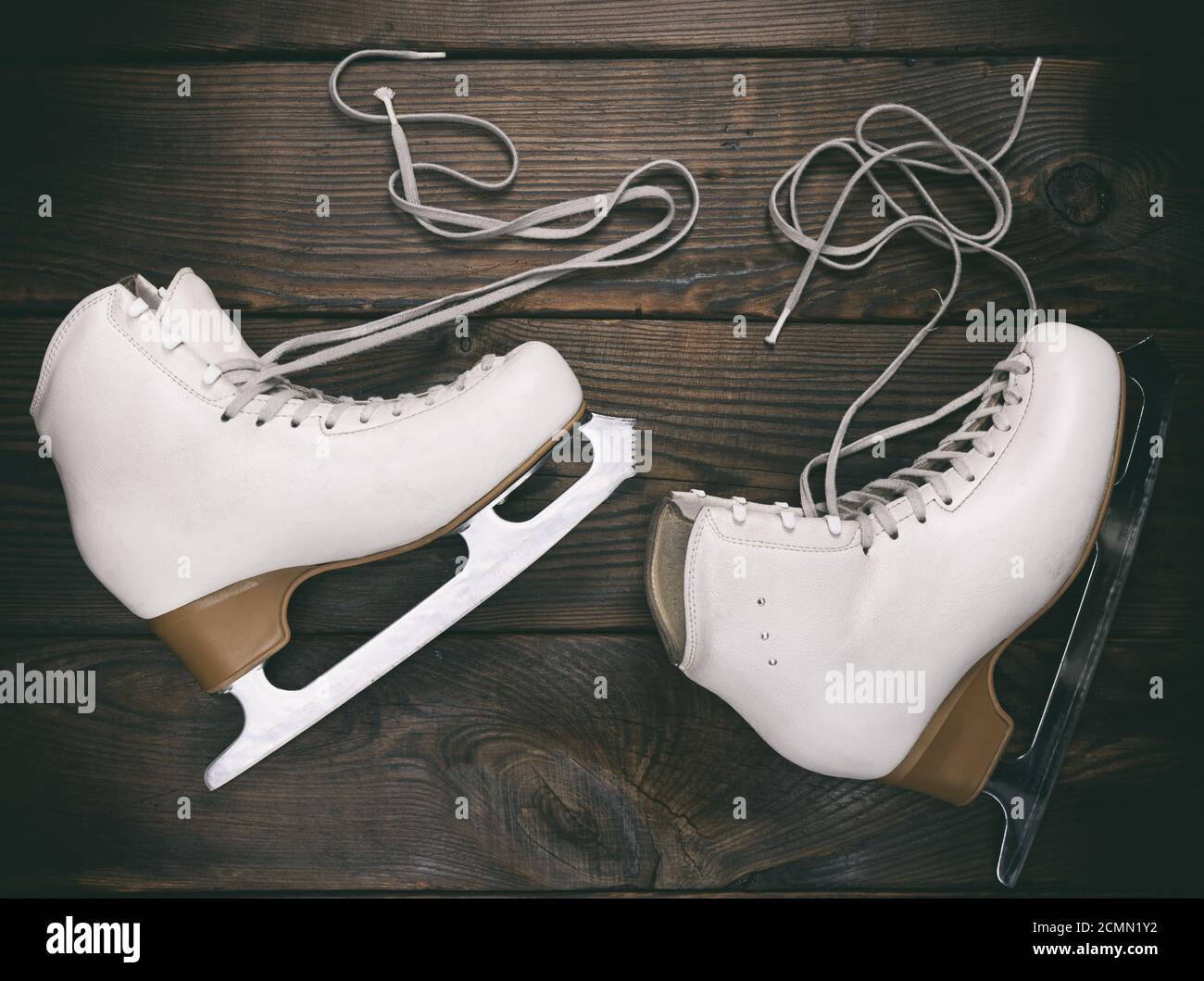old white female skates for figure skating with unbound laces Stock ...