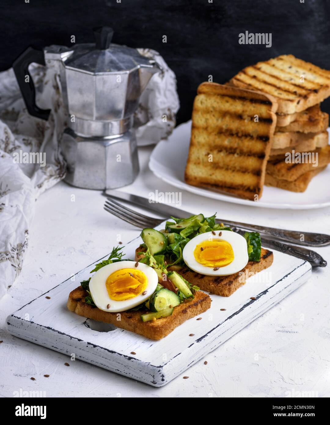 pieces of bread from white wheat flour with boiled egg Stock Photo - Alamy