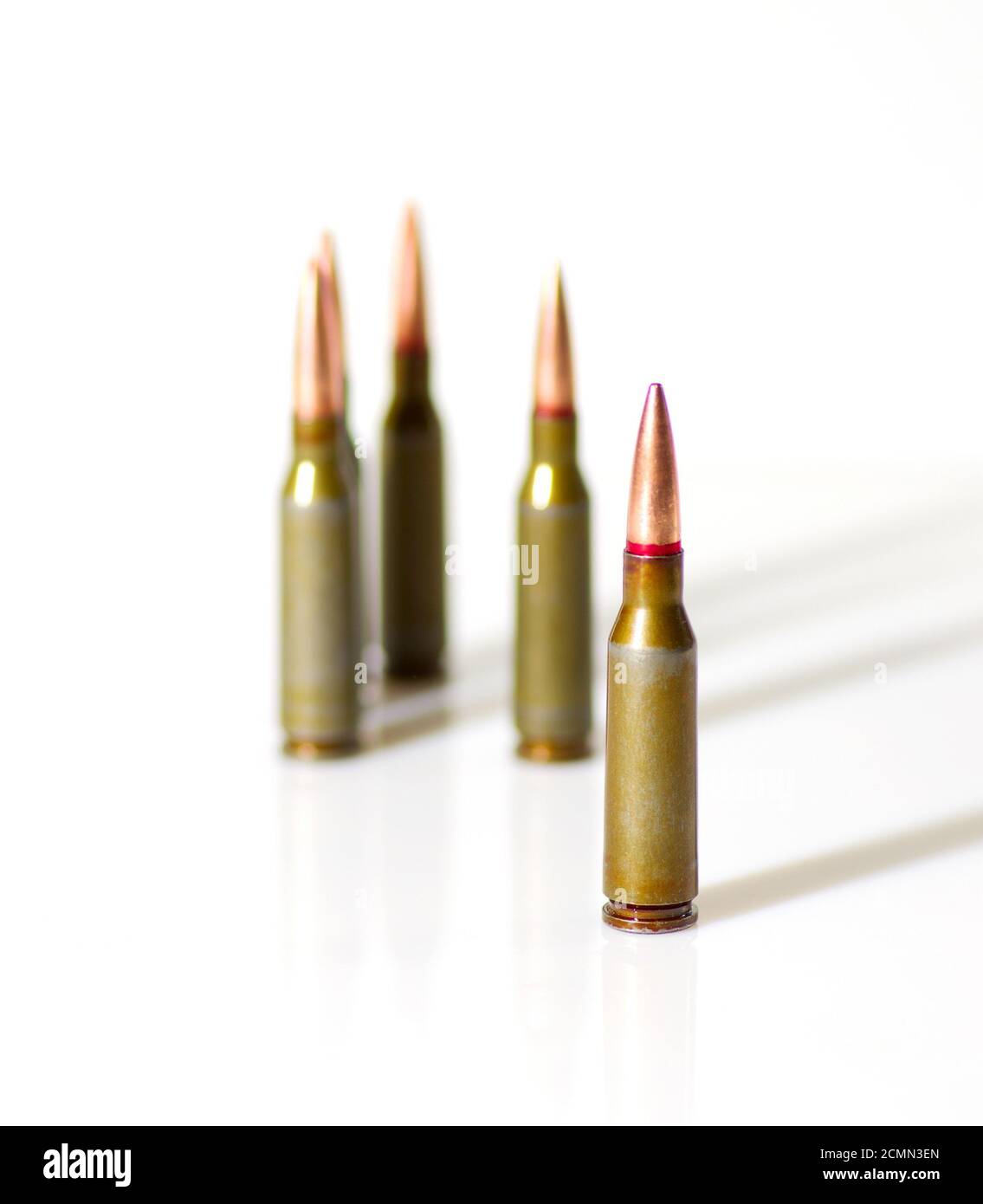 Ammunition cartridges on white background Stock Photo - Alamy