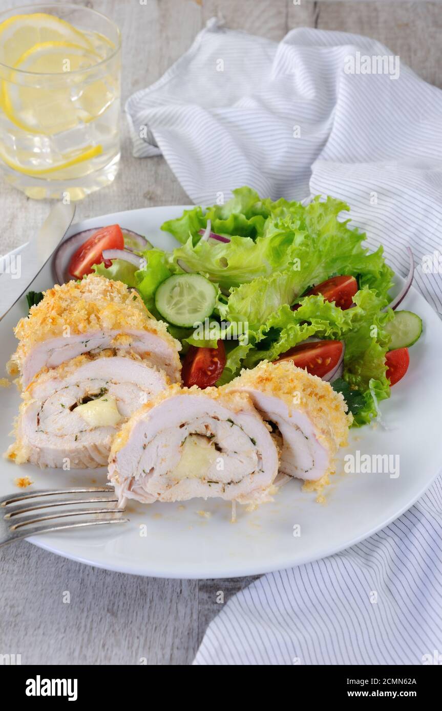 Sliced baked until golden, crispy crust chicken roll in breadcrumbs ...