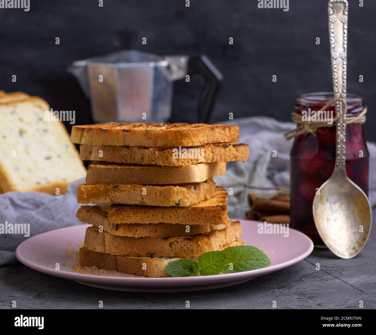 a stack of fried square slices of bread Stock Photo - Alamy