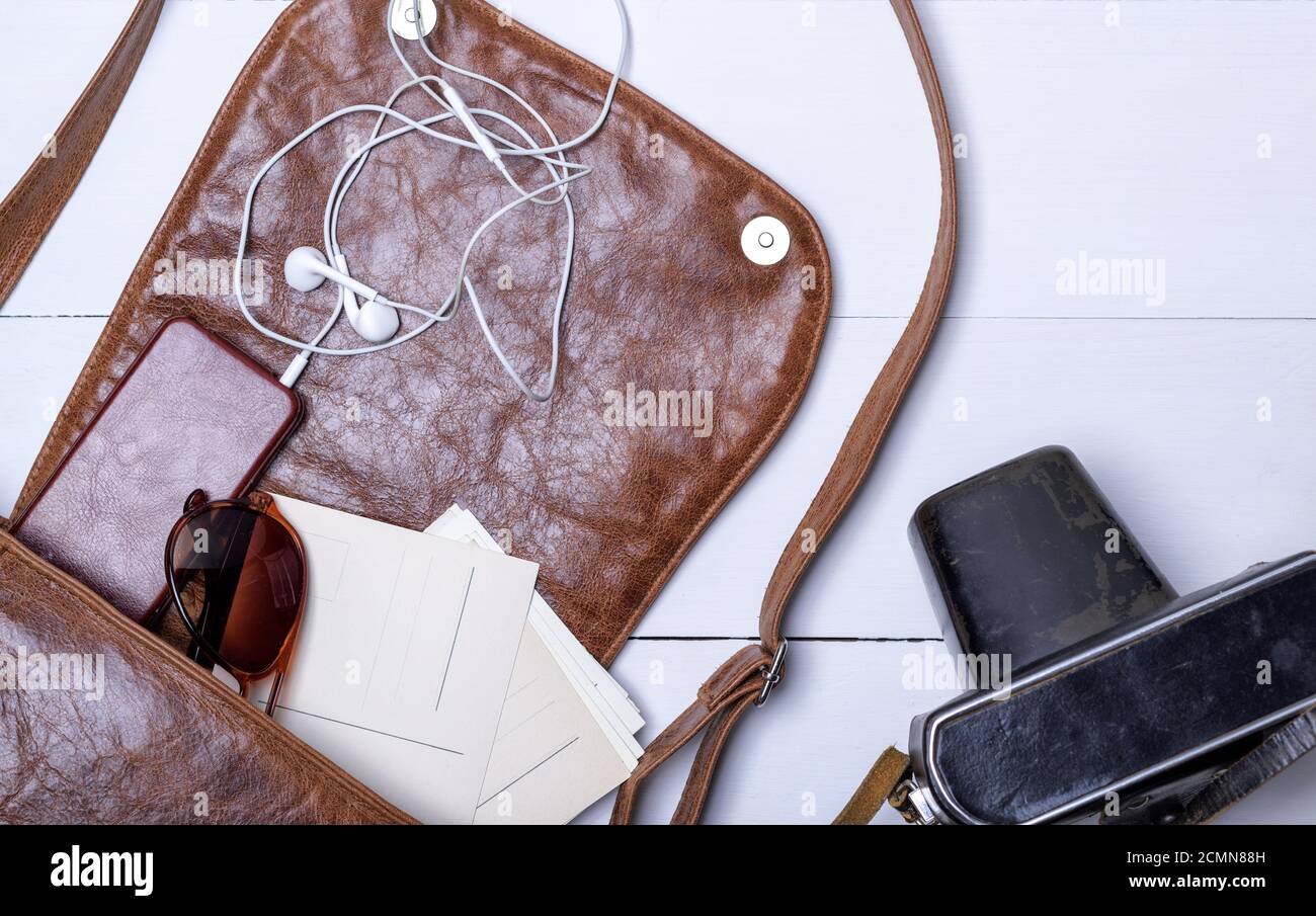 open female brown leather bag Stock Photo - Alamy