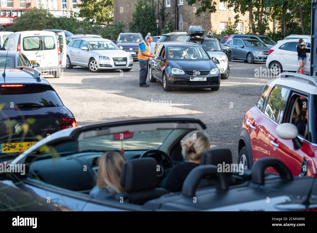 IMAGE PIXELLATED BY PA PICTURE DESK A member of staff deals with ...